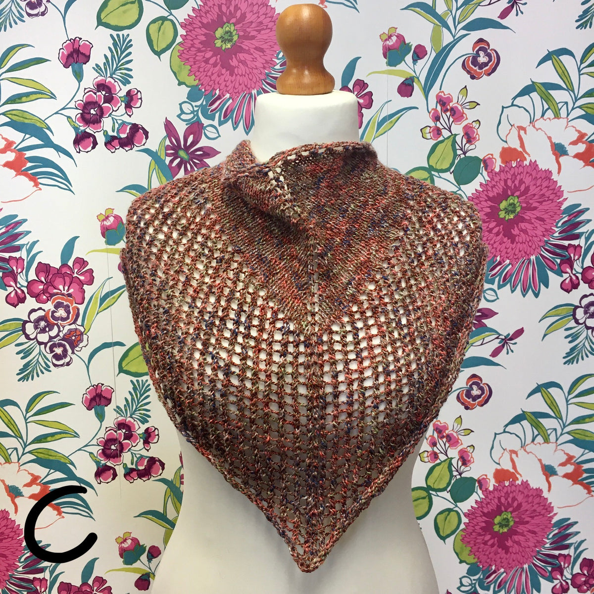 Free knitting pattern for an Eyelet Shawl at The Woolly Brew